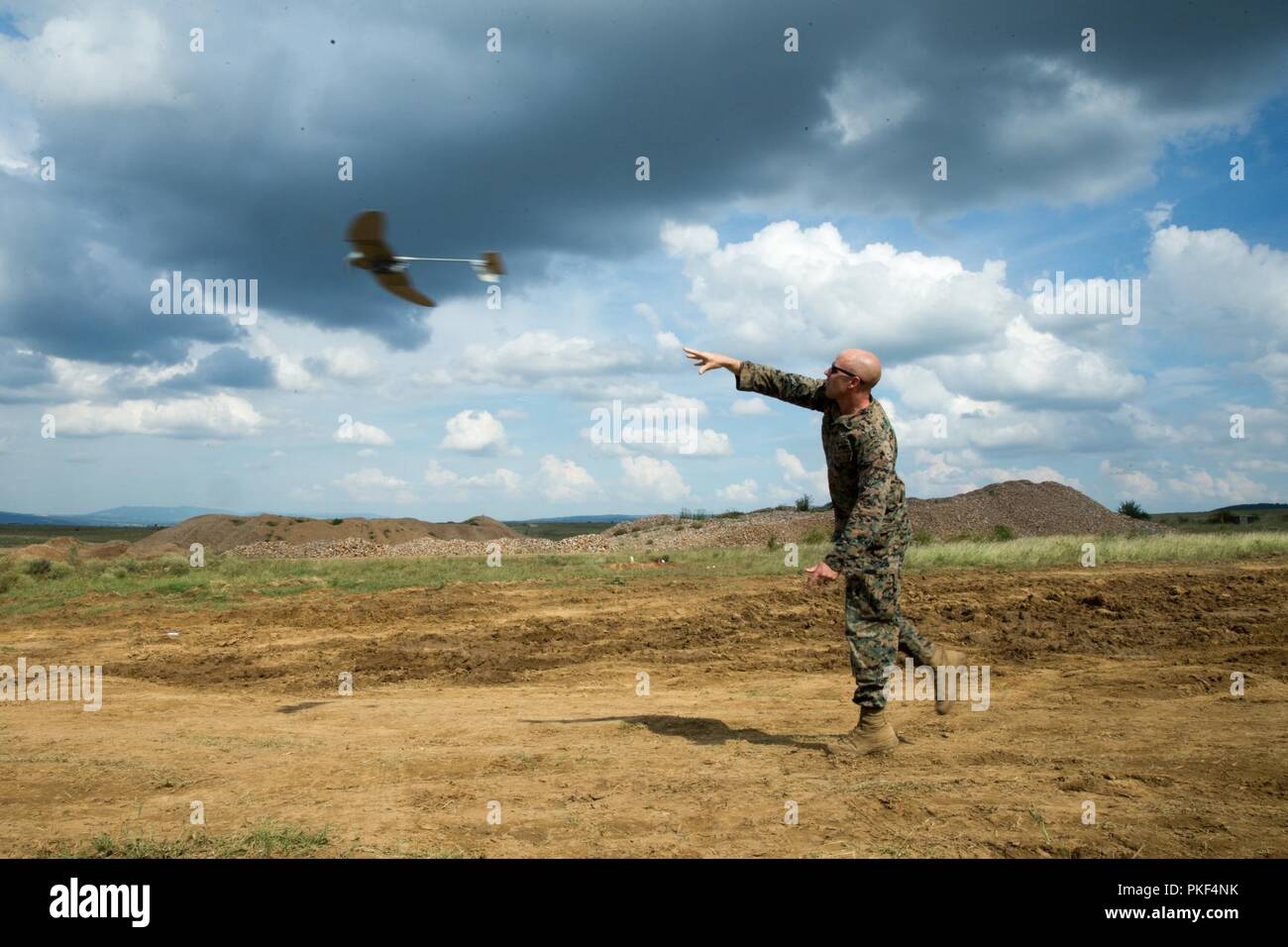 A U.S. Marine with Black Sea Rotational Force (BSRF) 18.1 launches a RQ ...