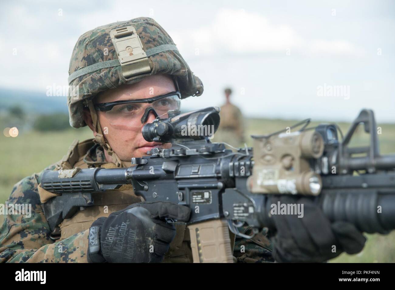 A U.S. Marine with Black Sea Rotational Force (BSRF) 18.1 provides ...