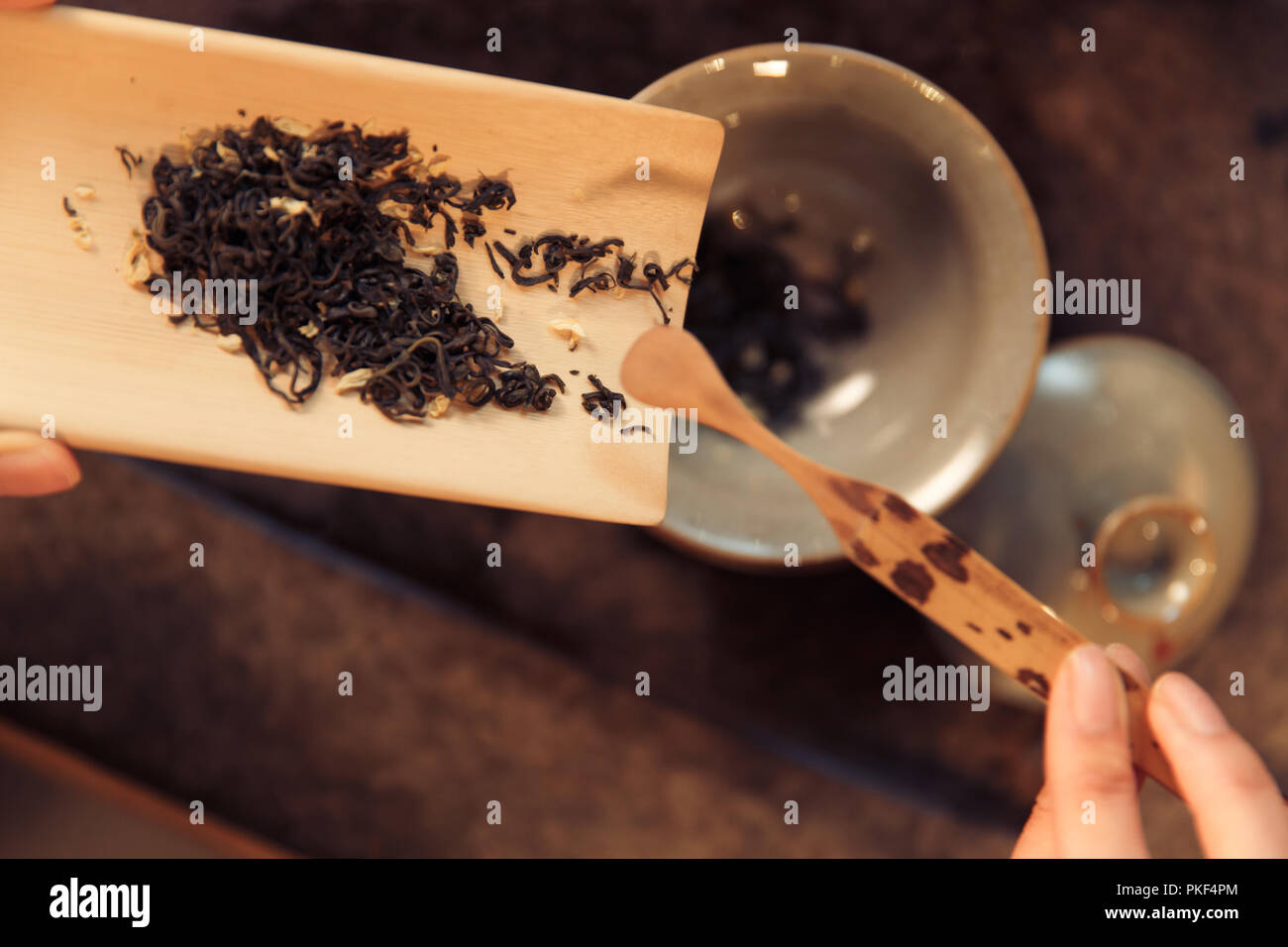 Young women make tea Stock Photo - Alamy
