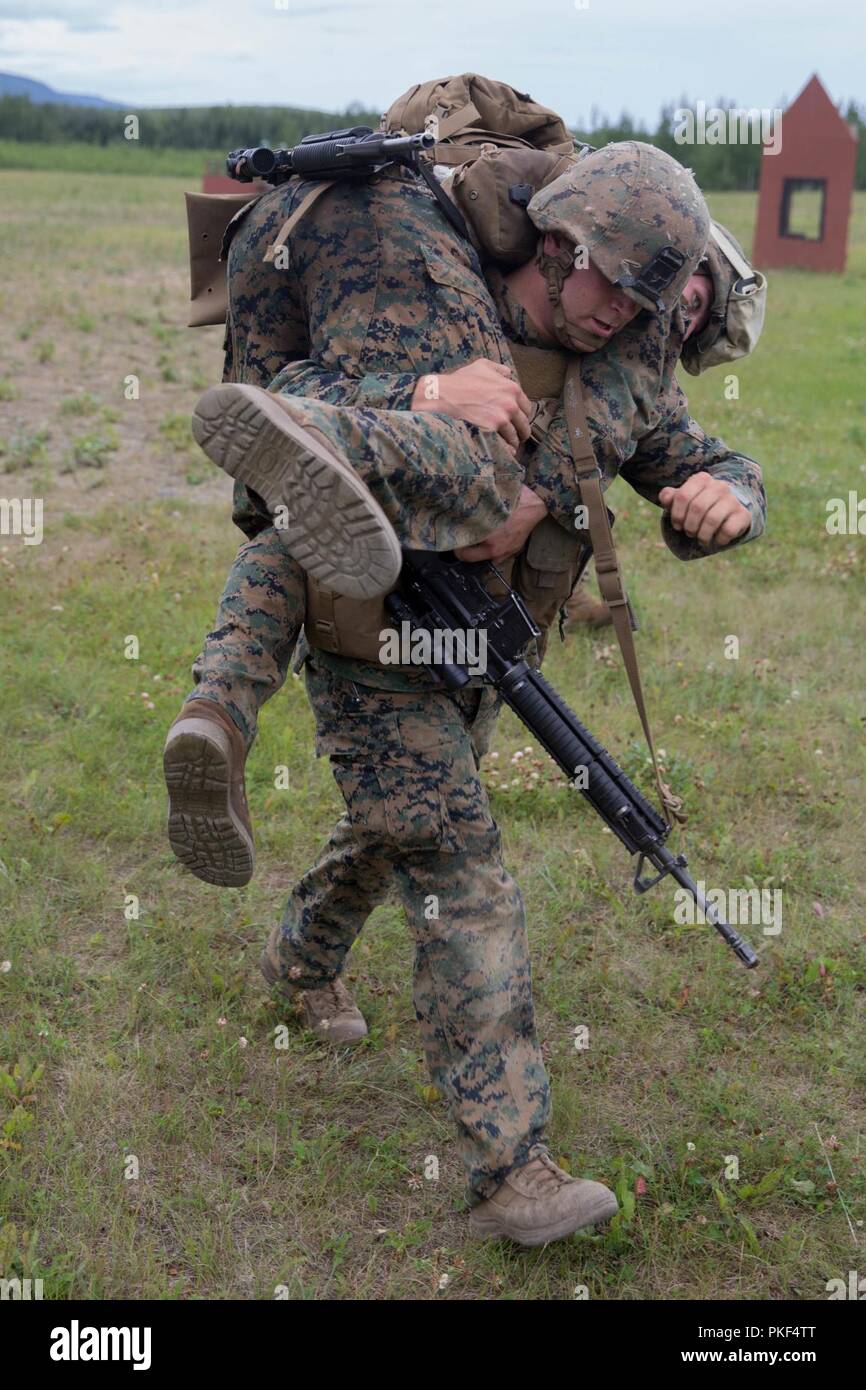 Marines with 3rd Battalion, 23rd Marine Regiment, competing in the 4th Marine Division Annual ...
