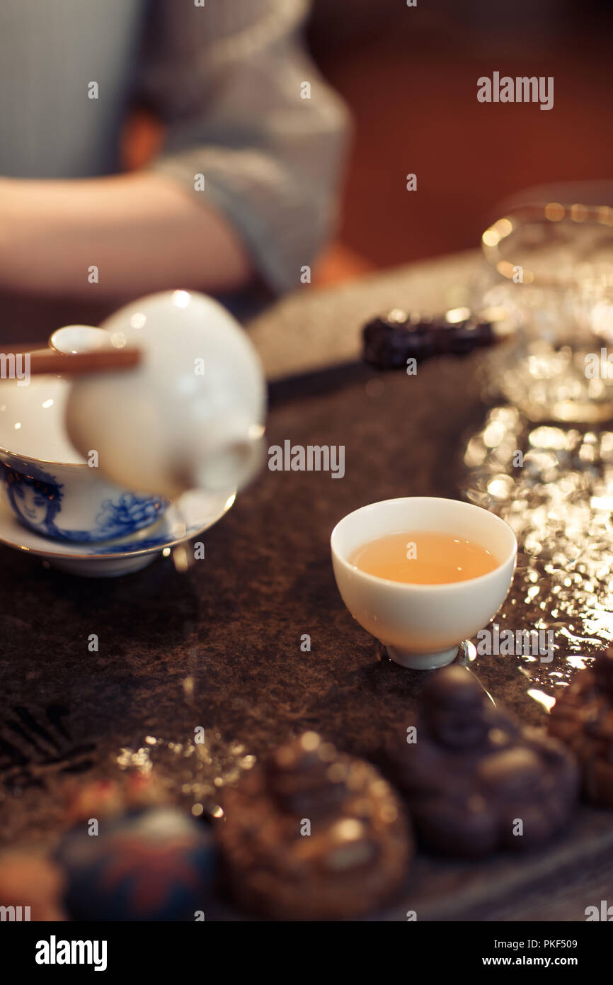 Young women make tea Stock Photo - Alamy