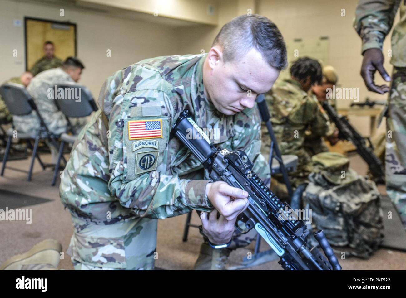 A U.S. Army Reserve Troop List Unit Soldier practices clearing an M249 ...