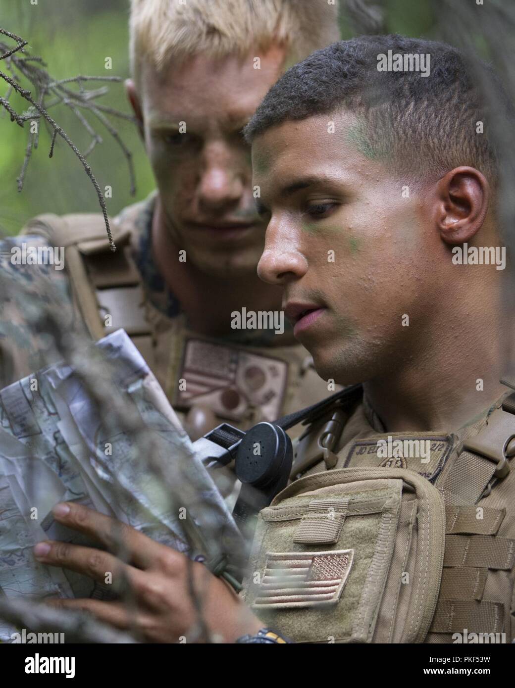 U.S. Marine Corps Sgt. James Ellis, right, the 3rd squad leader ...