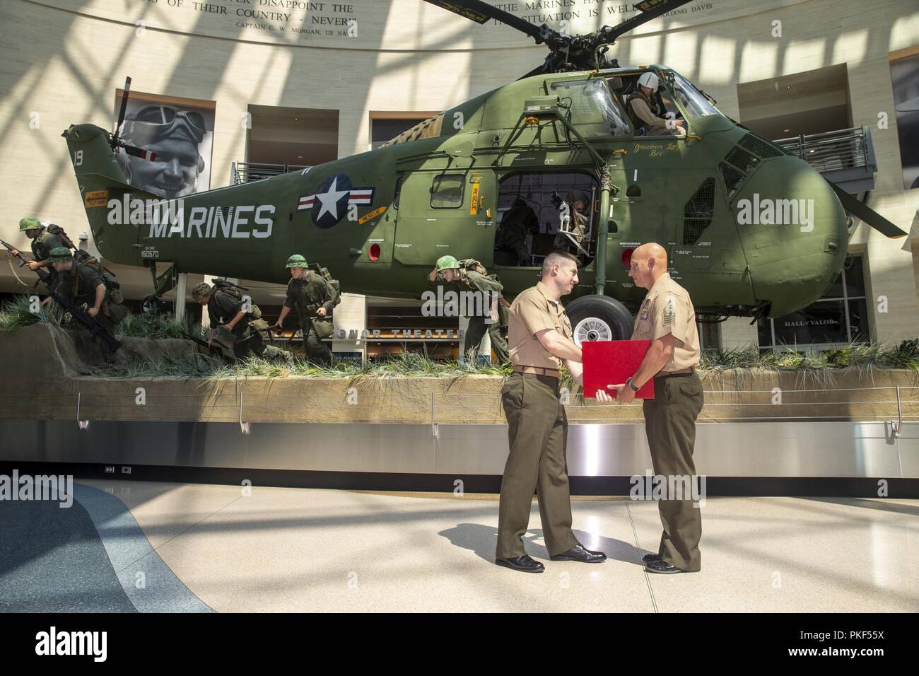U.S. Marine Corps Maj. Jonathan Zarling, left, assistant head, Manpower ...