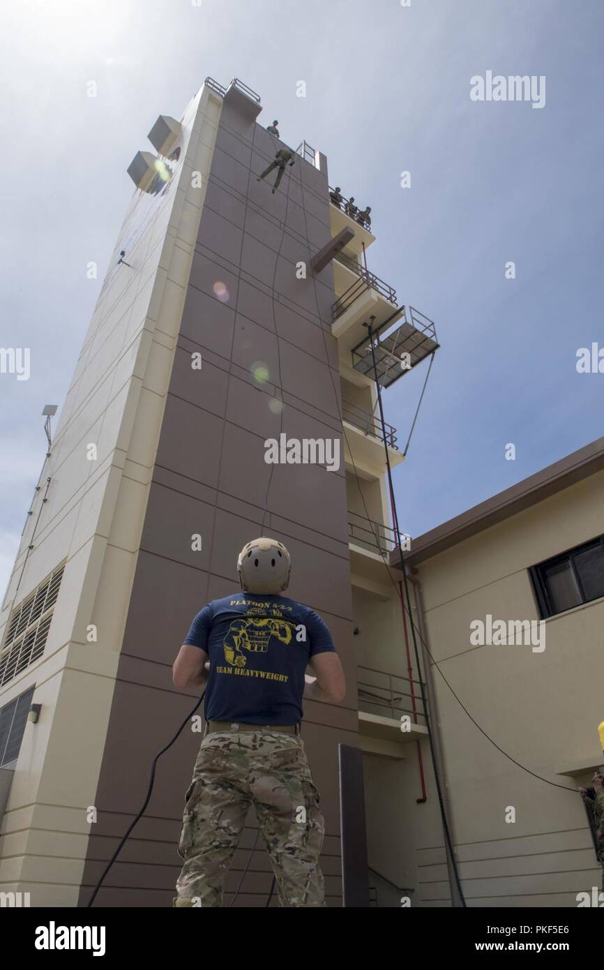 Sailors attached to Explosive Ordnance Disposal Mobile Unit (EODMU) 5 ...