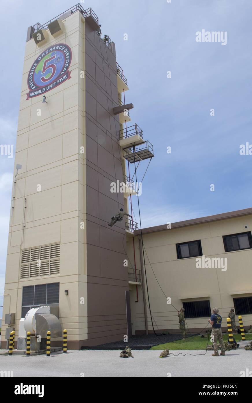 Sailors attached to Explosive Ordnance Disposal Mobile Unit (EODMU) 5 ...