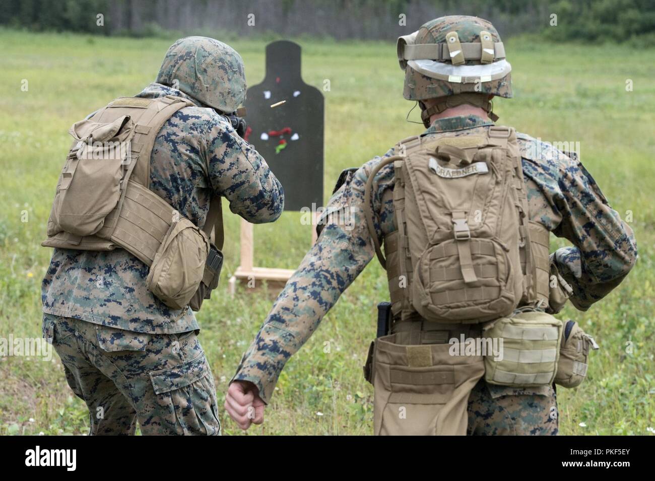 U.S. Marines assigned to Charlie Company, 1st Battalion, 23rd Marine ...