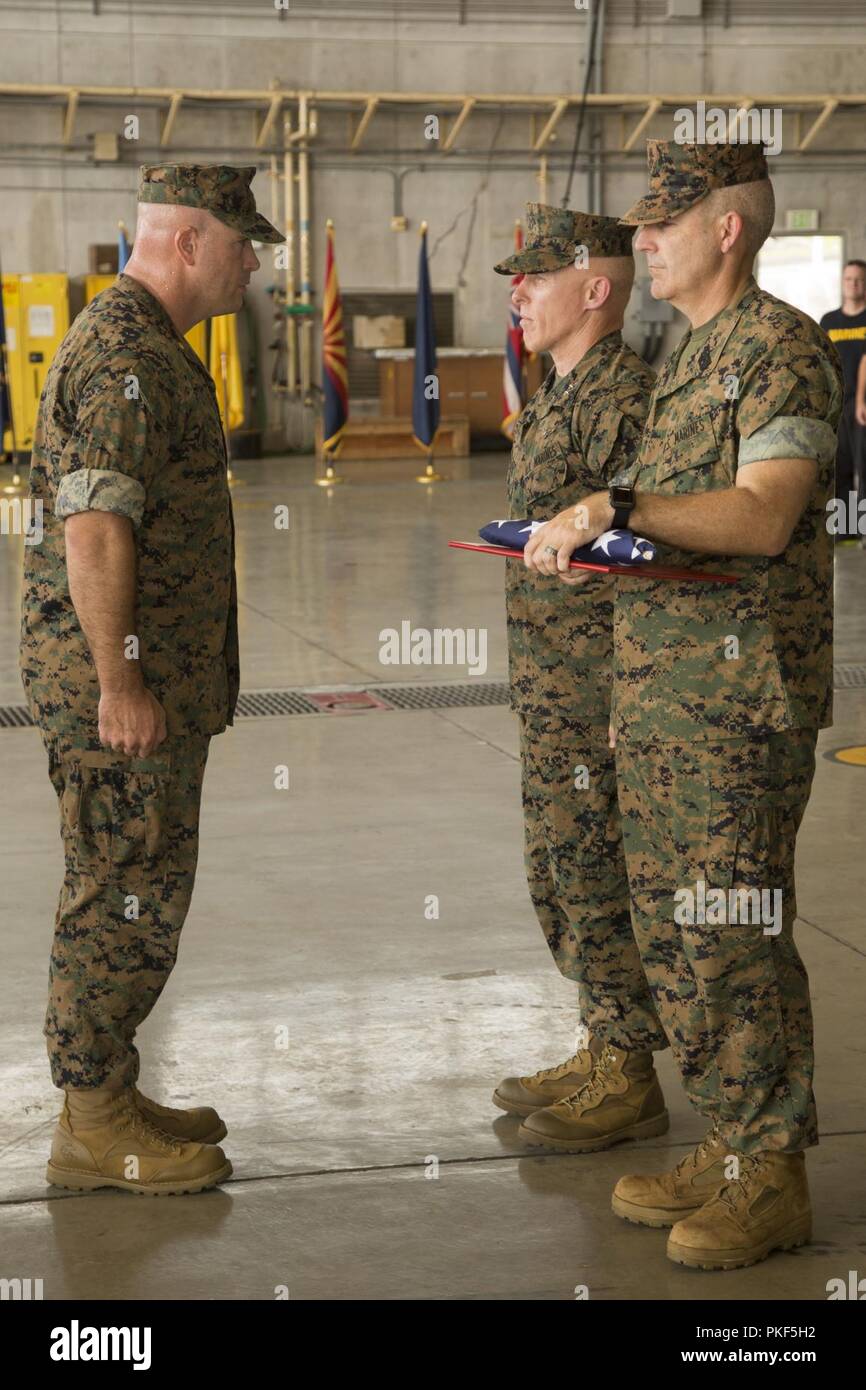 Maj. Daniel Groeling, receives awards and a U.S. Flag during his ...