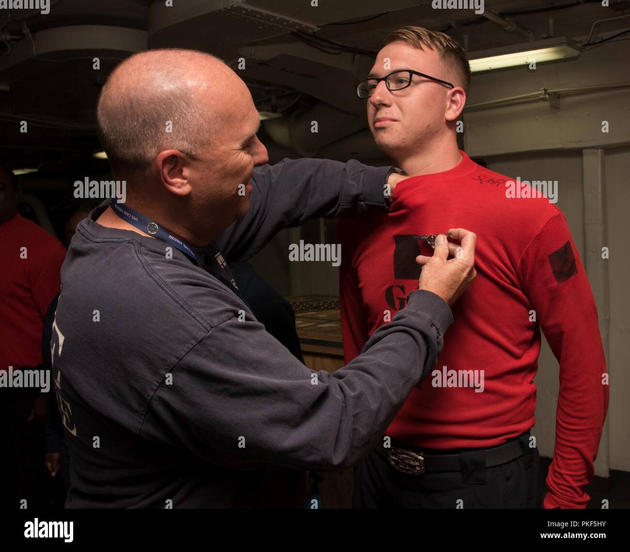 PACIFIC OCEAN (August 6, 2018) Airman Joseph Suhr is pinned with his ...