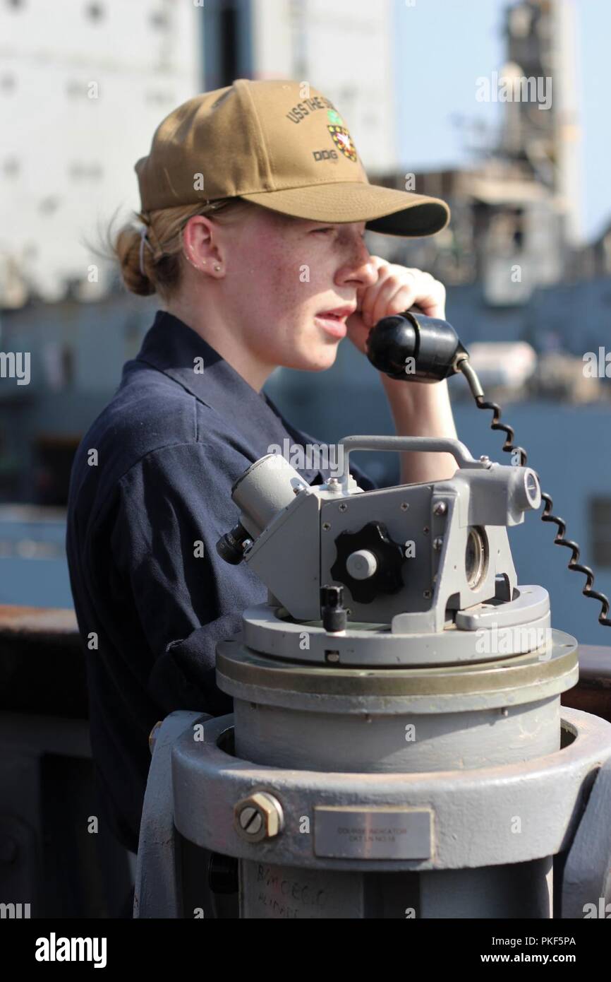ARABIAN GULF (August 2, 2018) Ensign Abby Stone stands watch as conning ...