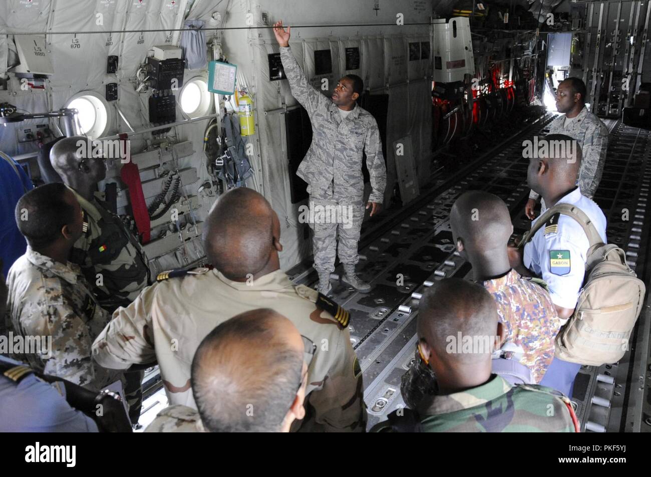 U.S. Air Force Staff Sgt. Kyle Chestnut, a Flying Crew Chief assigned ...