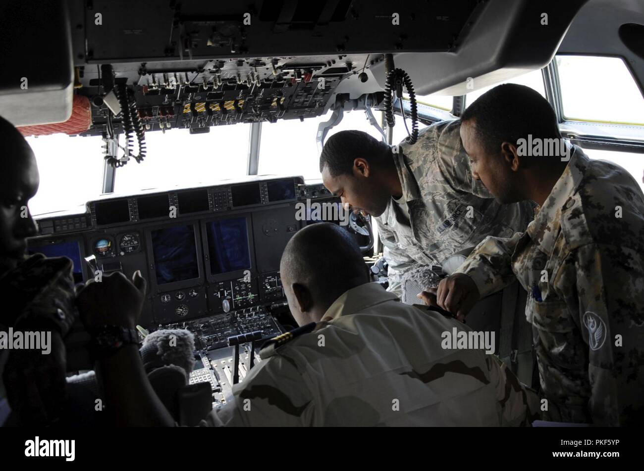 U.S. Air Force Staff Sgt. Kyle Chestnut, a Flying Crew Chief assigned ...