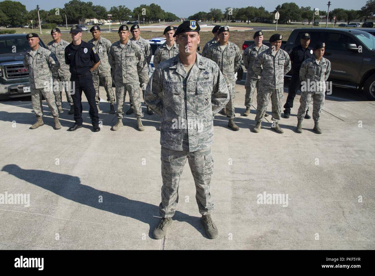U.S. Air Force Security Forces members stand in formation prior to the ...