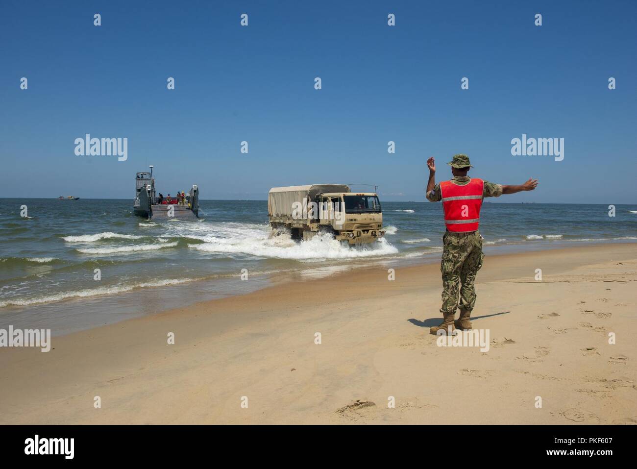 VIRGINIA BEACH, Va. (July 26, 2018) A Sailor from Beachmaster Unit (BMU ...