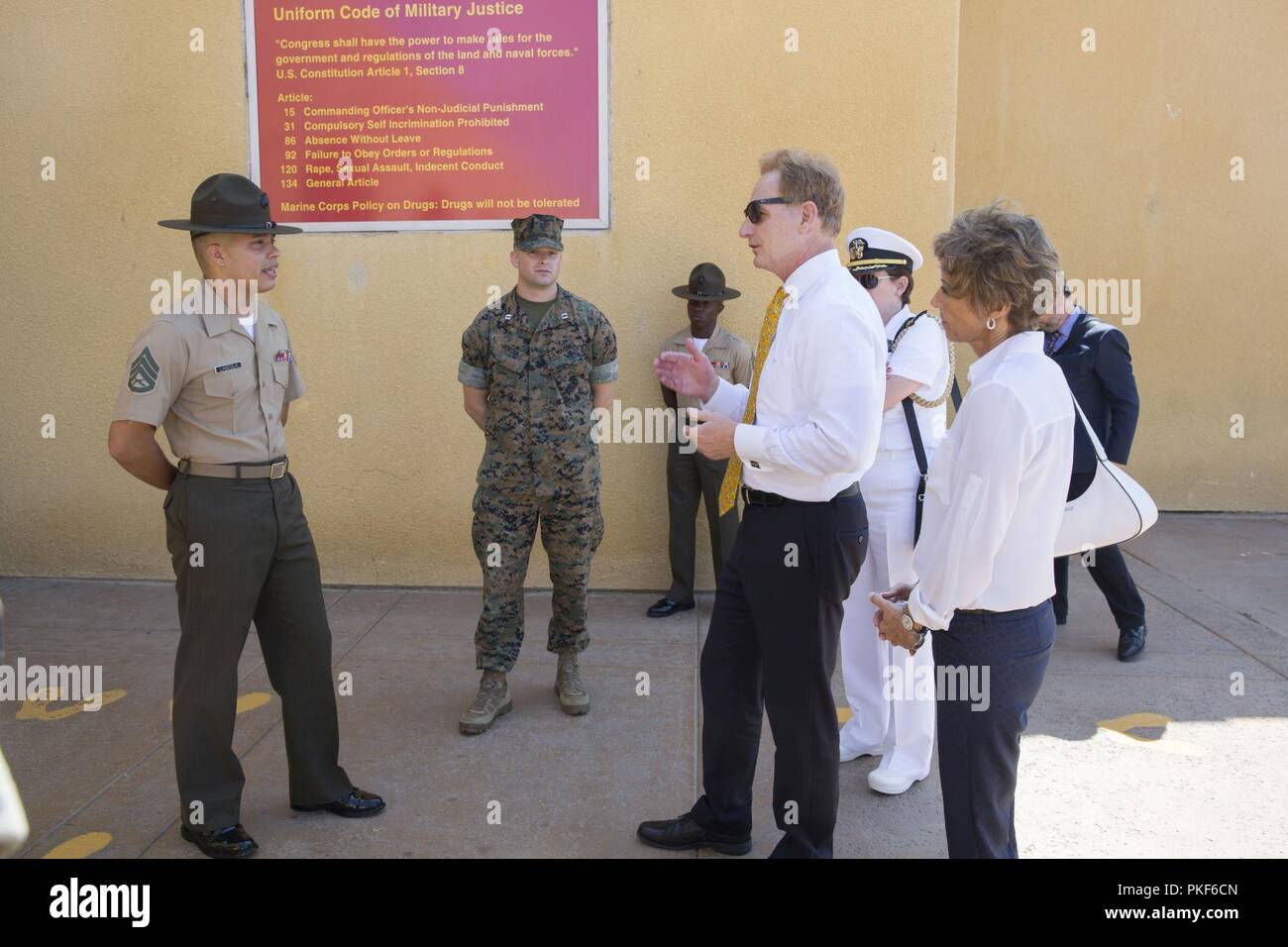 Under Secretary of the Navy Thomas B. Modly speaks with Marines from ...