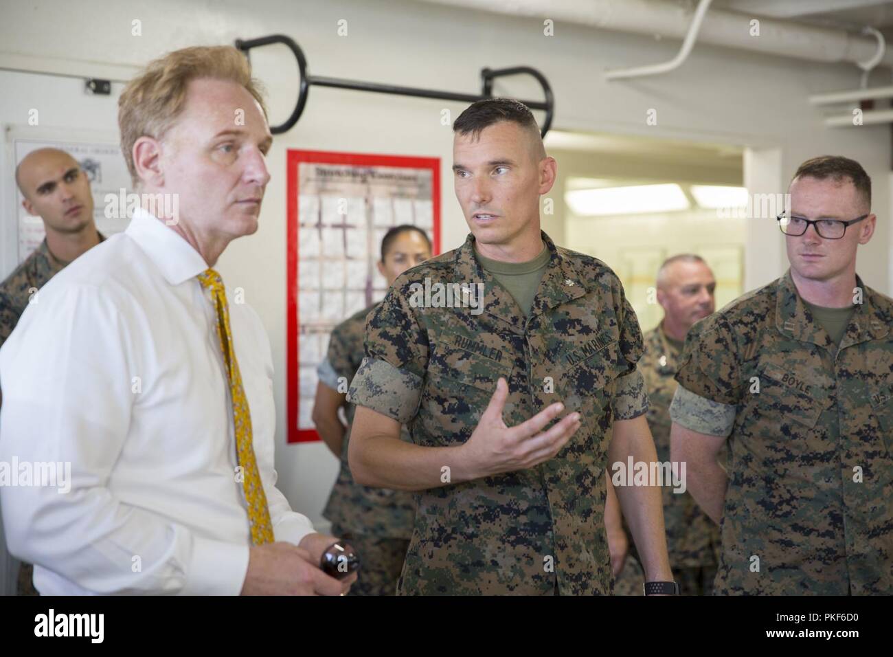 Under Secretary of the Navy Thomas B. Modly speaks with Marines from ...
