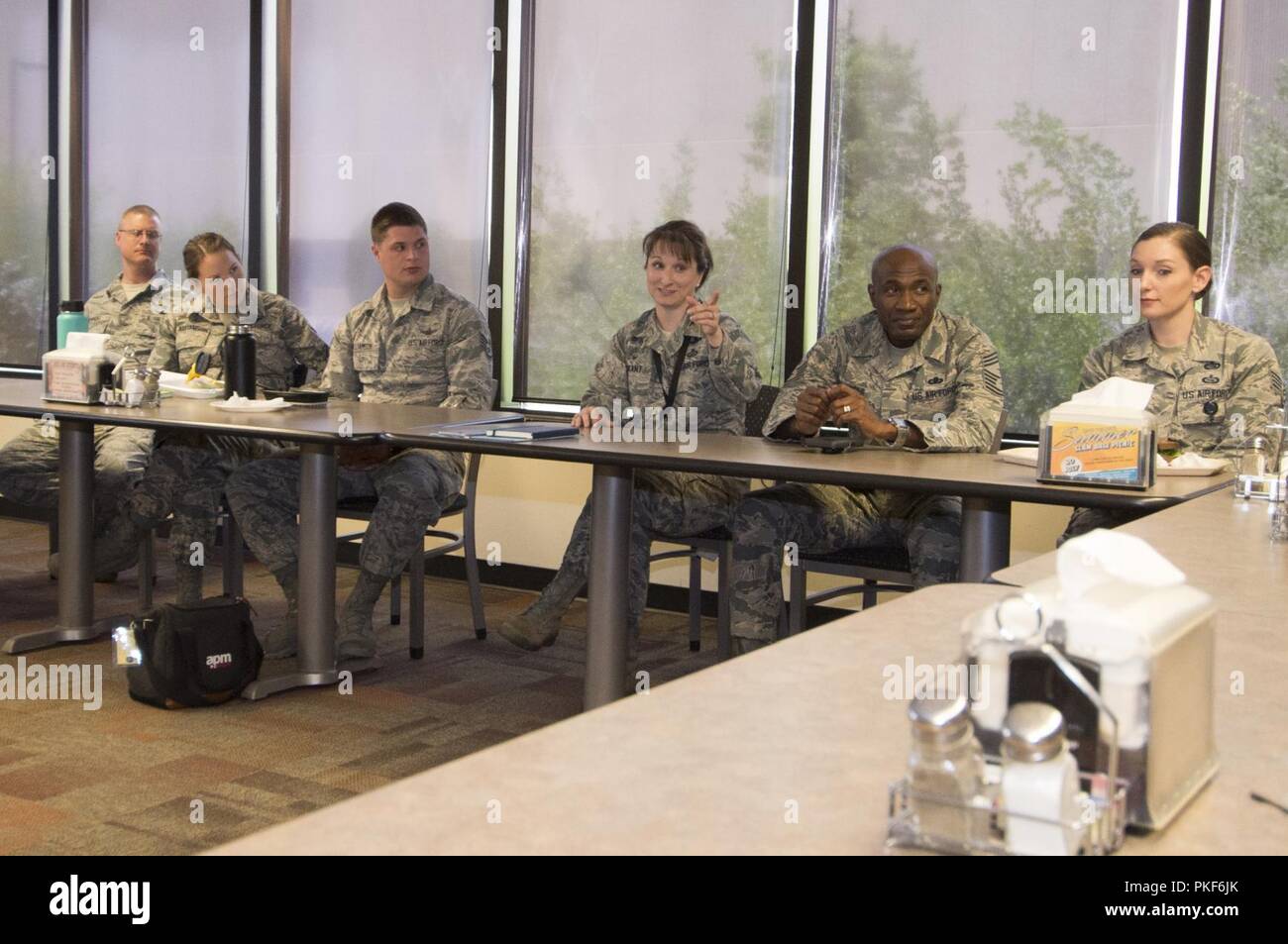 Col. Jennifer Grant, commander of the 50th Space Wing, center, and ...