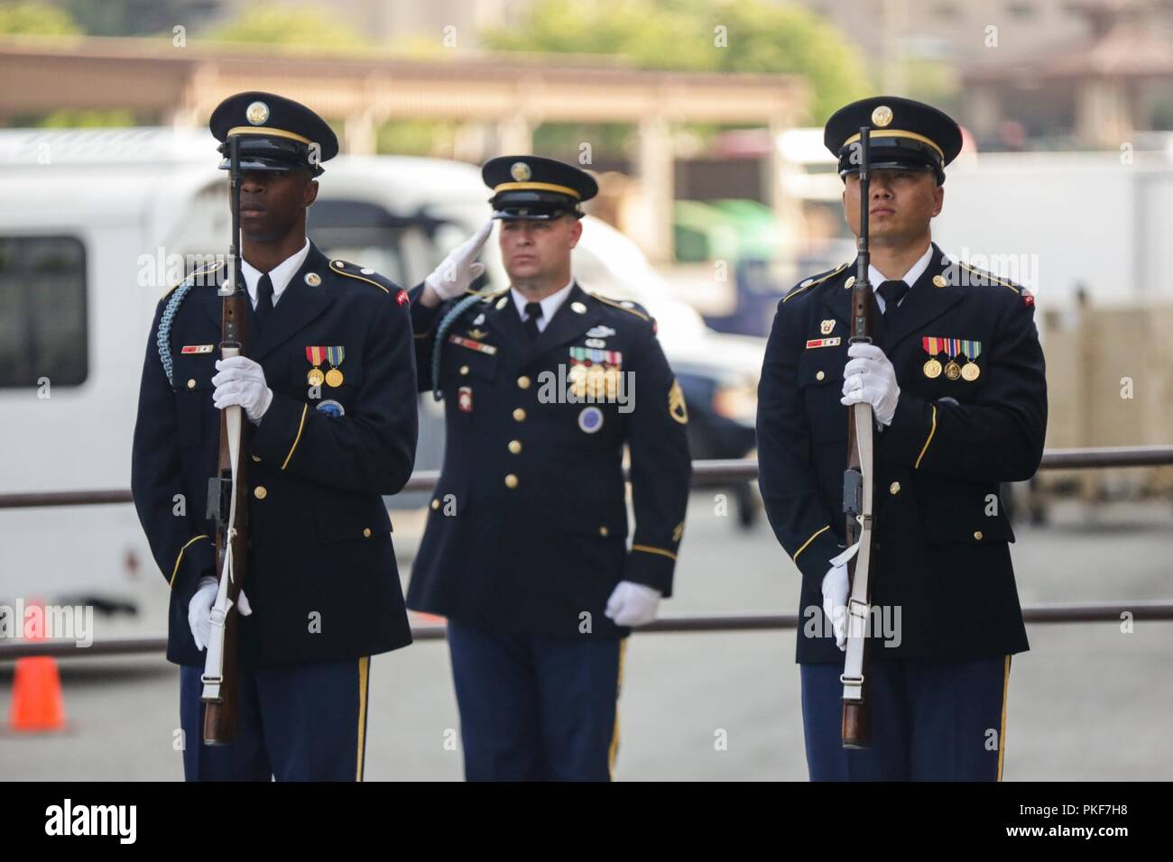 Multinational armed forces Honor Guard present arms during the ...