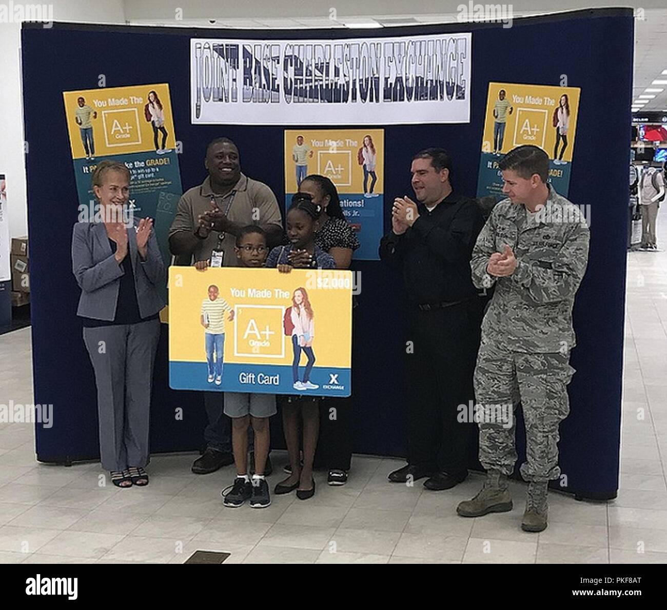 Fifth-grader Gerald Wells receives a $2,000 Exchange Gift Card as the ...