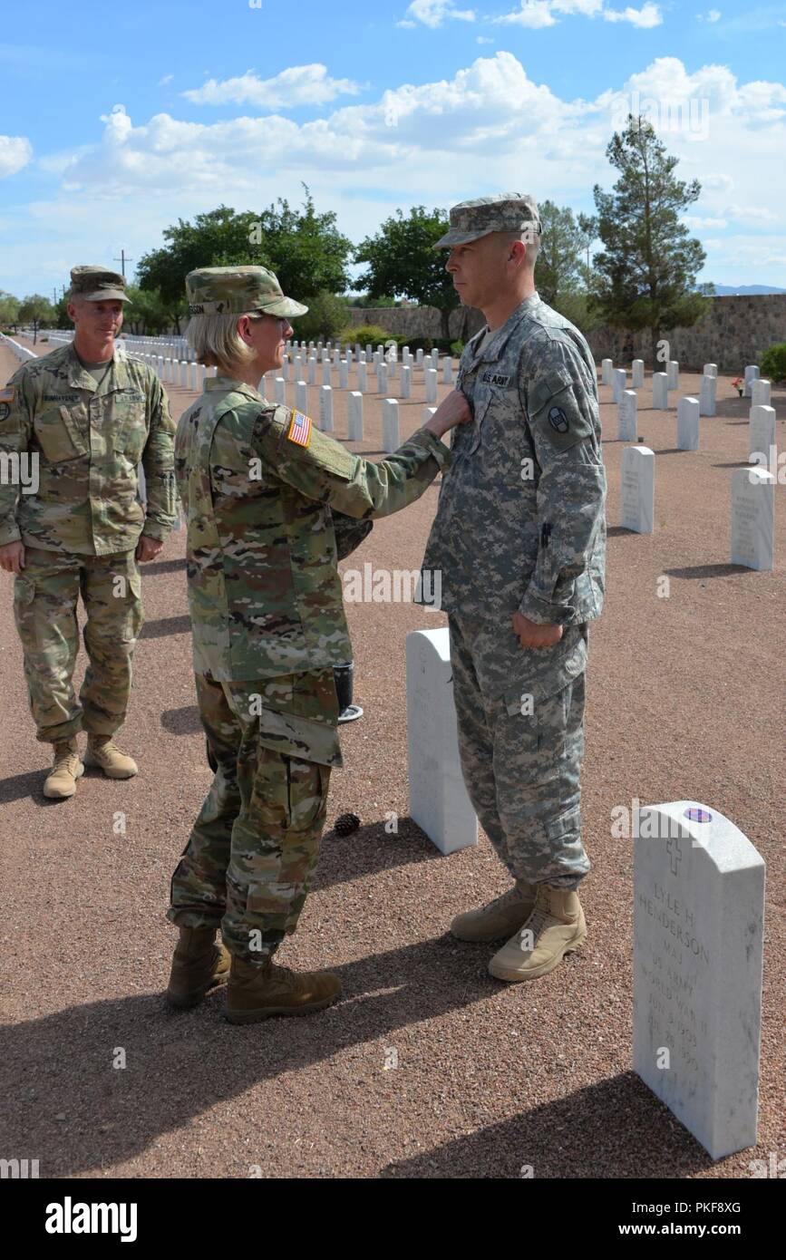 Fort Bliss, TX - LTC Christina Henderson pins her husband’s new rank of ...