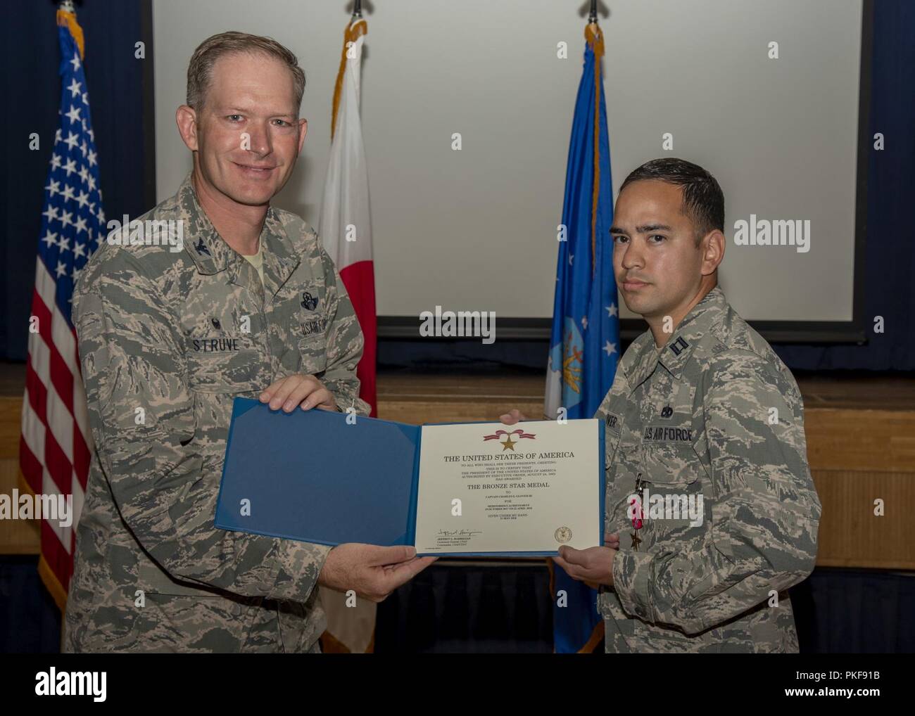 Capt. Charles Glover was presented a Bronze Star Medal for his ...