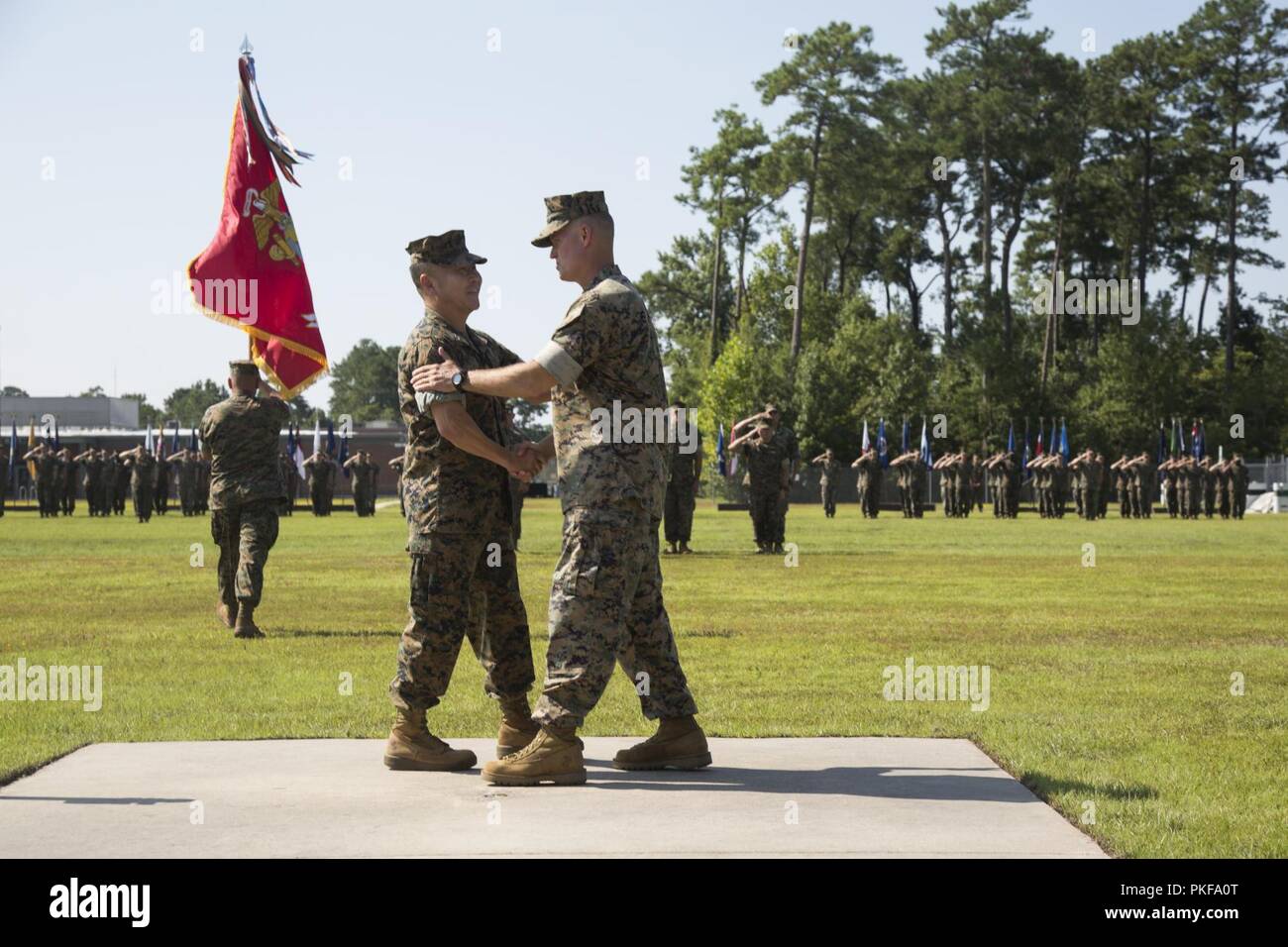 U.S. Marine Corps Lt. Gen. Carl E. Mundy III, right, congratulates Maj ...