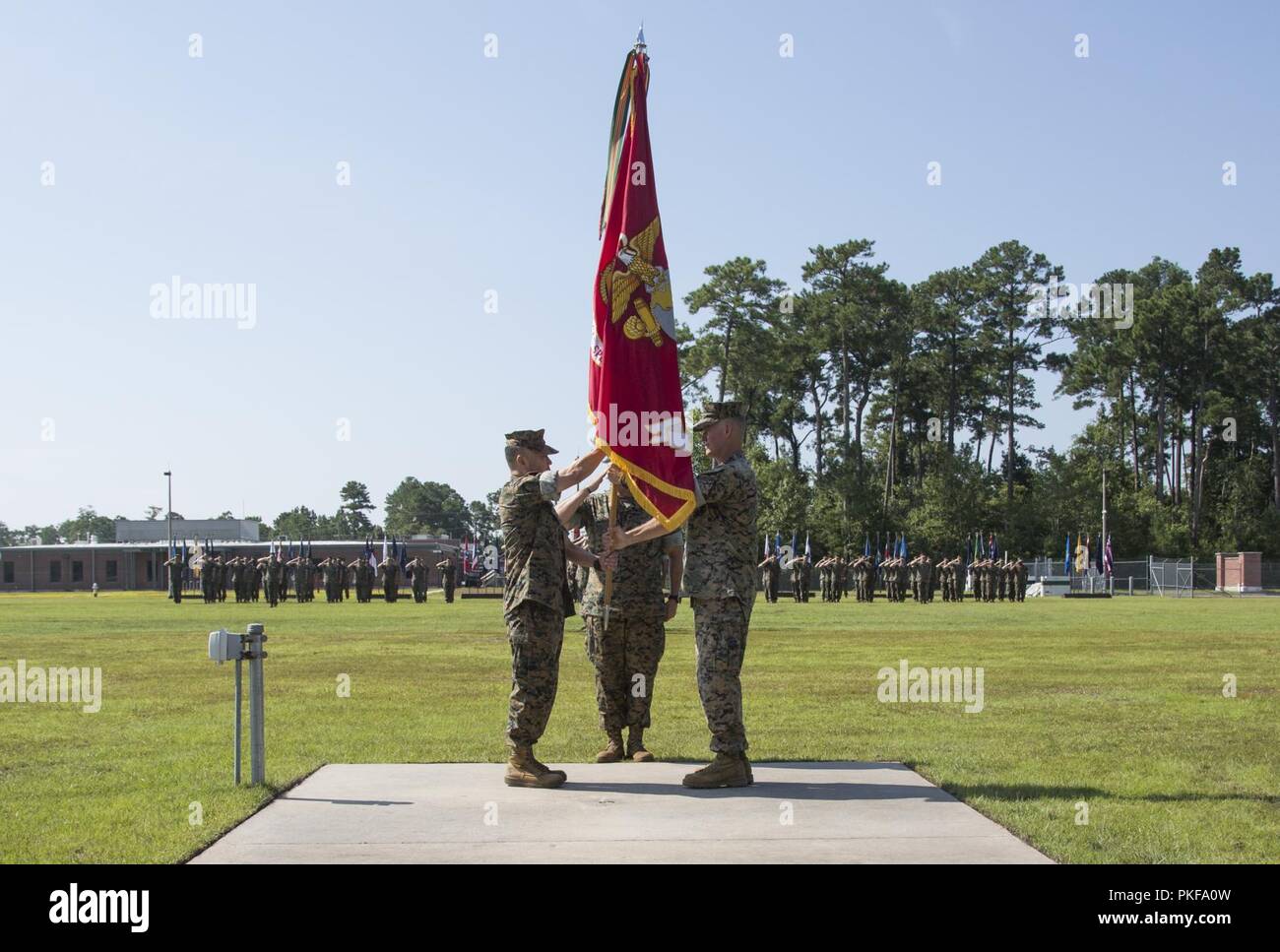 U.S. Marine Corps Lt. Gen. Carl E. Mundy III, right, passes the Marine ...
