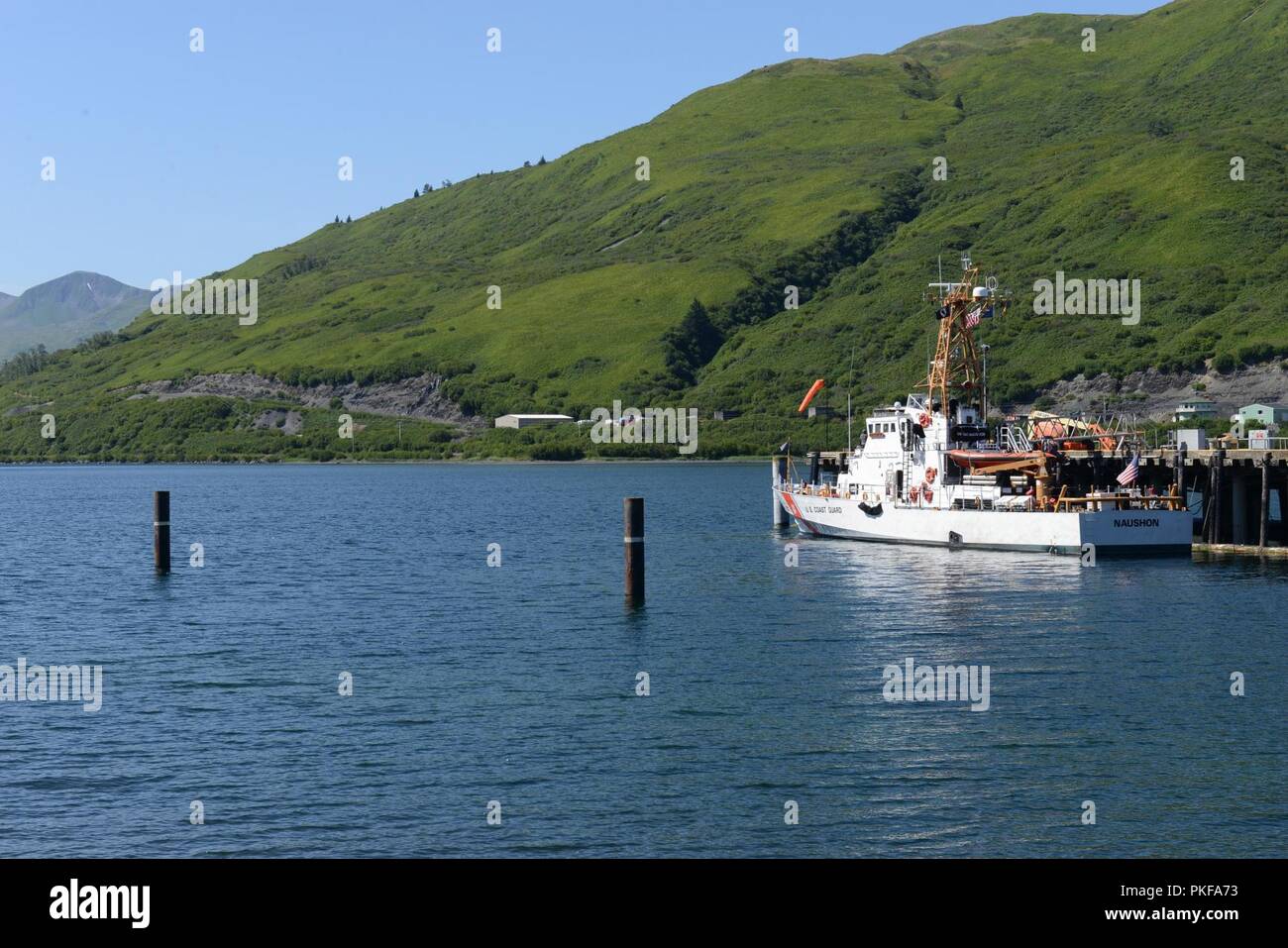 The Coast Guard Cutter Naushon (WPB 1311) crew moors up to a pier in ...