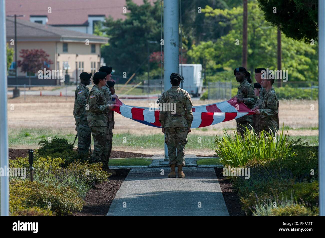 Flag bears prepare the American Flag in front of the I Corps ...