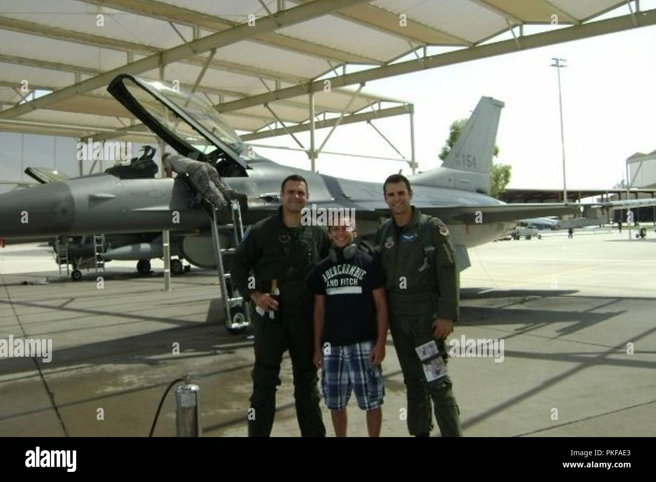 Kelly (left), Dylan and Rex pose for a photo before Kelly's ...