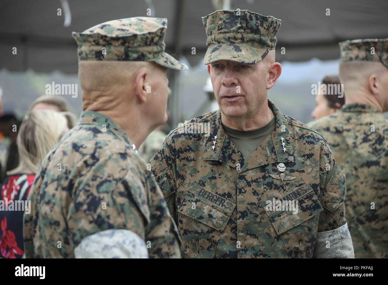 Commandant of the Marine Corps Gen. Robert B. Neller, left, speaks to ...