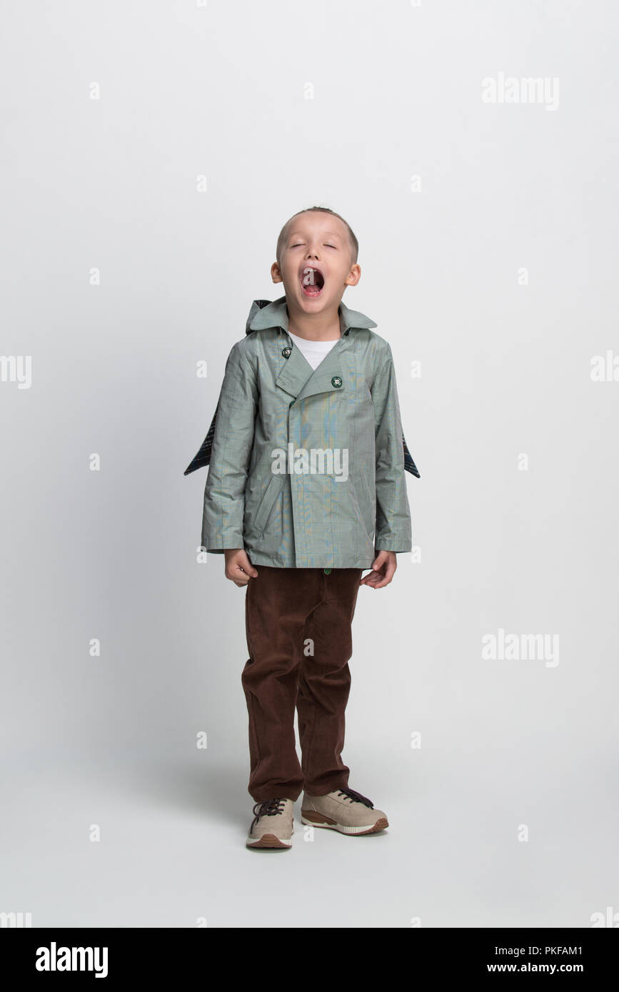 screaming little boy on white background, studio shooting Stock Photo ...