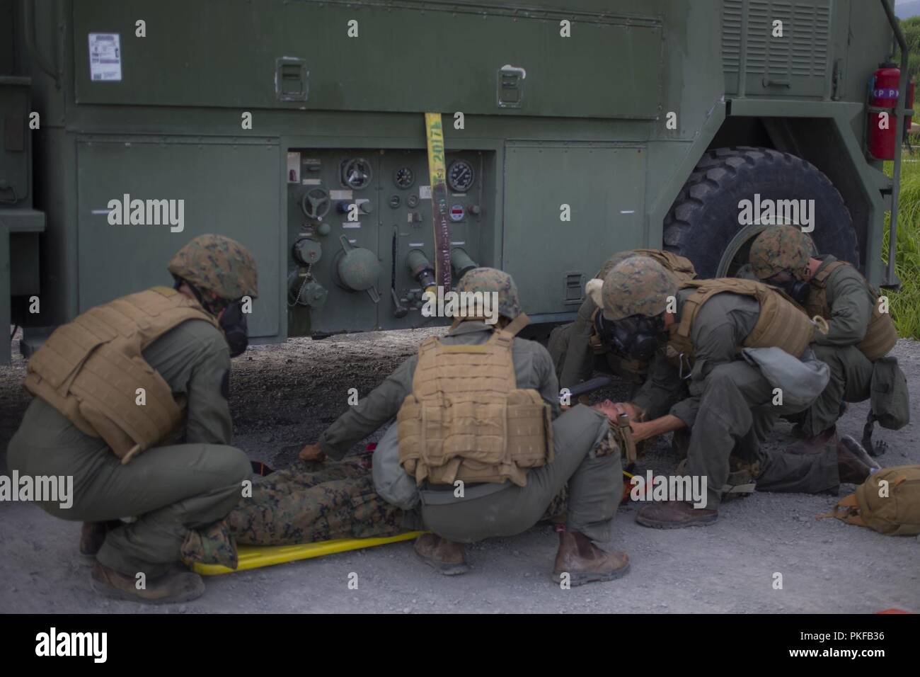 U.S. Marines with Marine Wing Support Squadron (MWSS) 171 conduct a ...