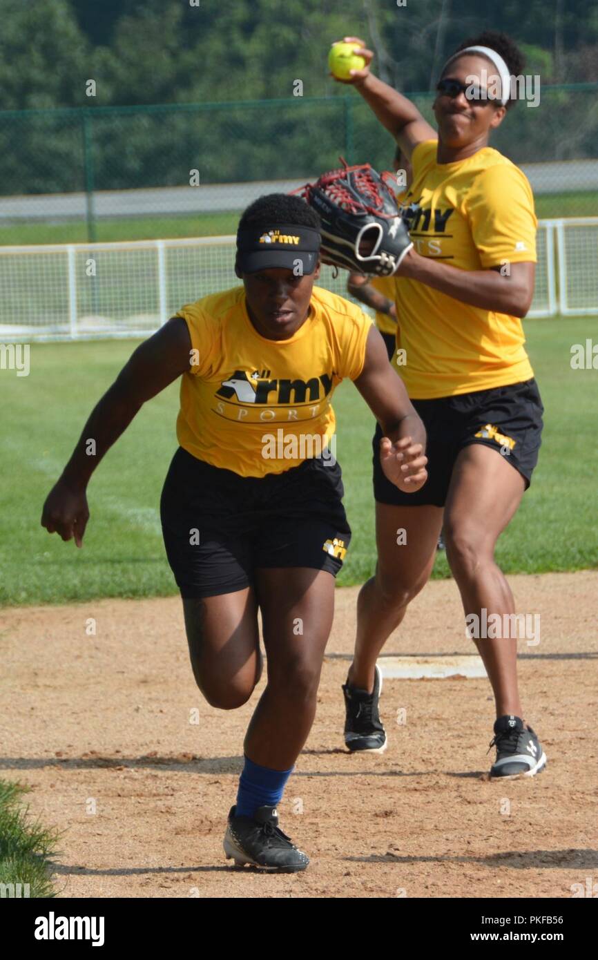 Sgt. Ninostka Amarogarcia, stationed at Fort Hood, Texas throws a ball ...