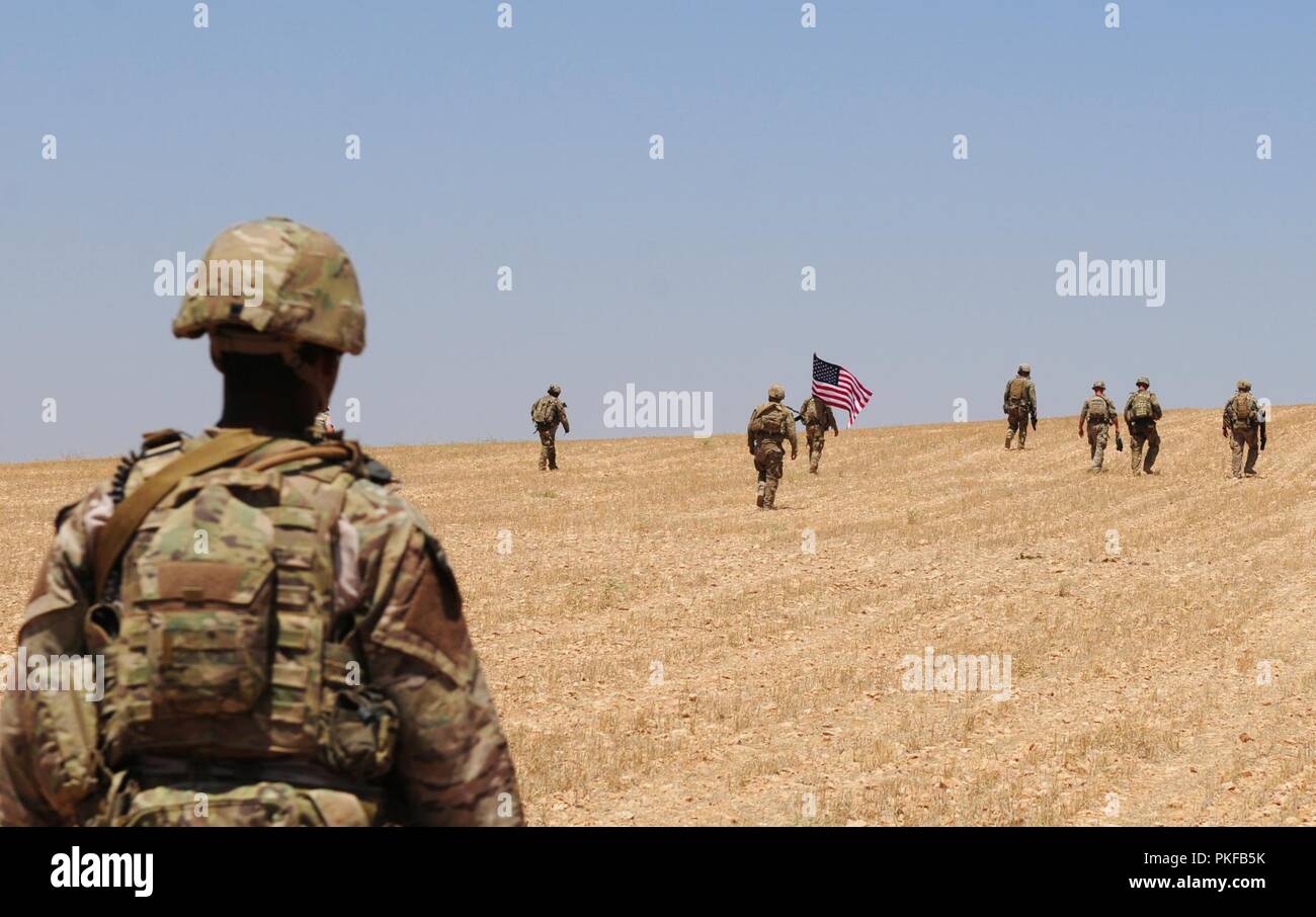 U.S. Soldiers walk to a coordination point during an independent ...