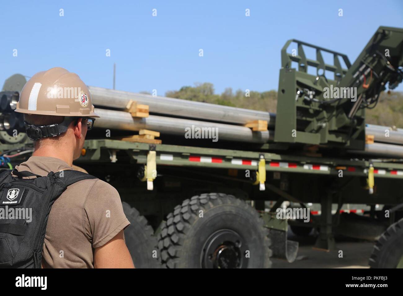 U.S. Navy Equipment Operator Constructionman Colton Wilson, assigned ...