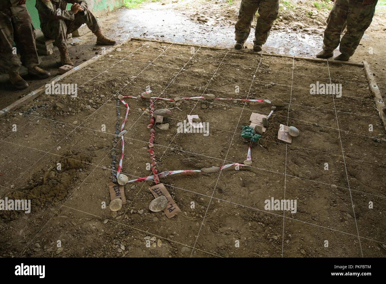 Soldiers with 2nd Battalion, 5th Cavalry Regiment plan a combined arms ...