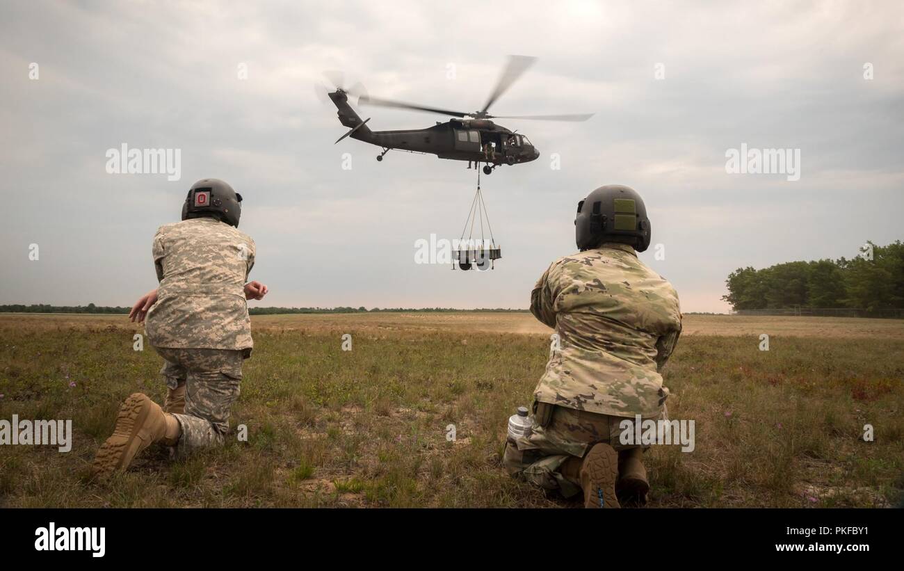 U.S. Army Capt. Eric Hapner, left, and Spc. Dominic Mondragon, Company ...