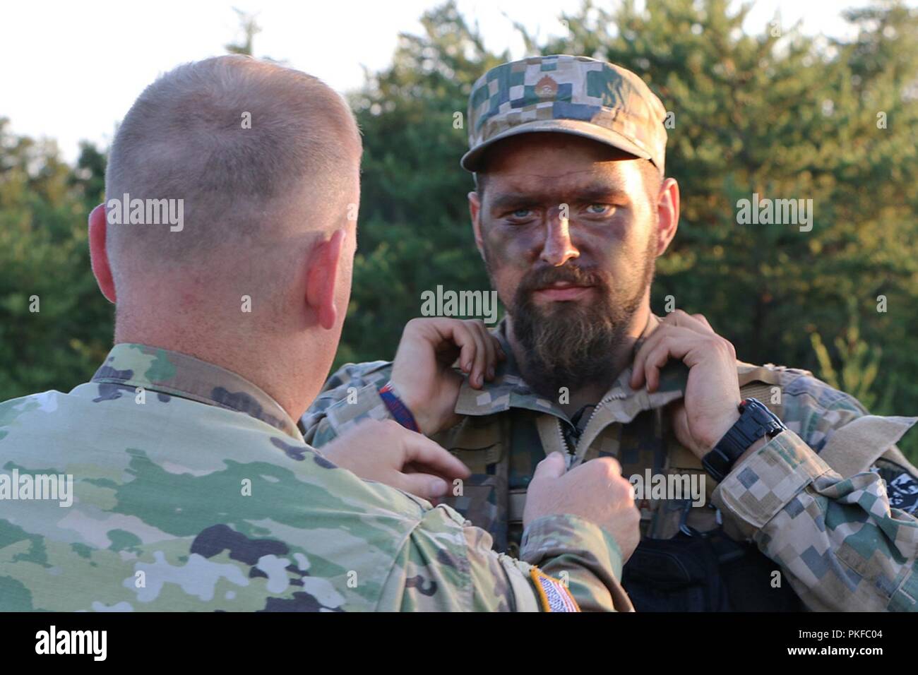 CAMP GRAYLING, Mich. - Pvt. Arturs Arturs Kaupuzs with Combat Support ...
