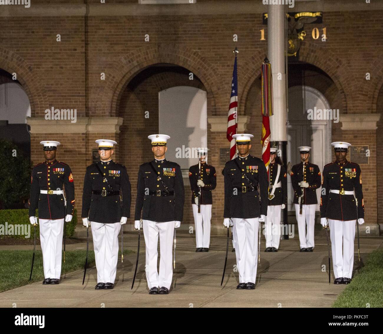 Marines with the Marine Barracks Washington D.C. parade marching staff ...