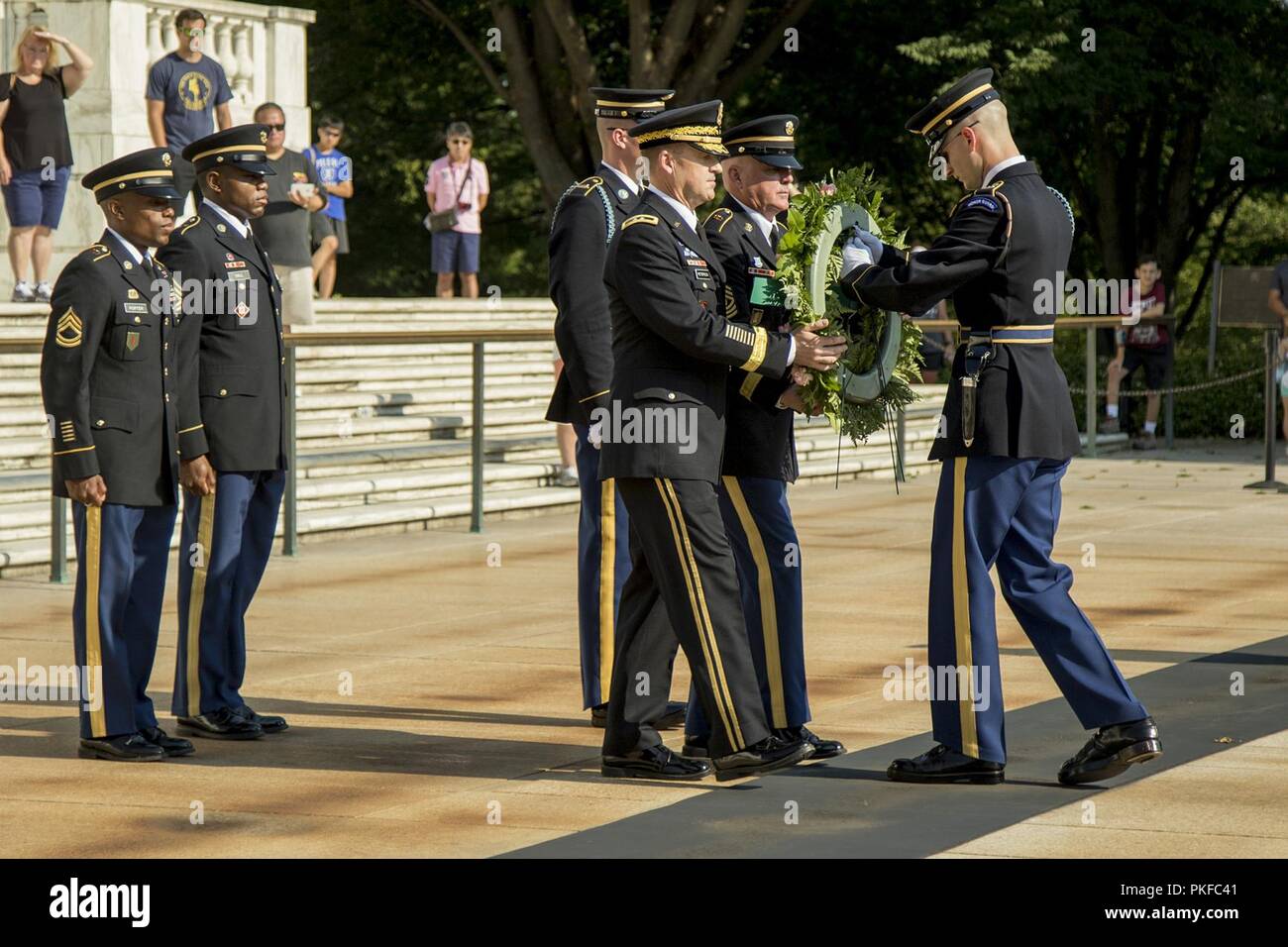 Army Maj. Gen. Erik Peterson, left, acting commanding general of First ...