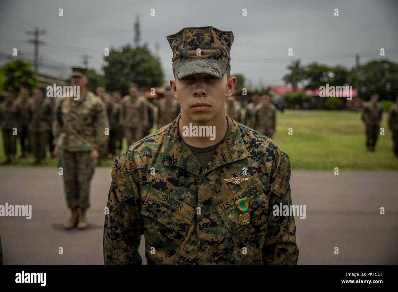 U.S. Marine Cpl. James Snider, a CH-53E Super Stallion crew chief with ...