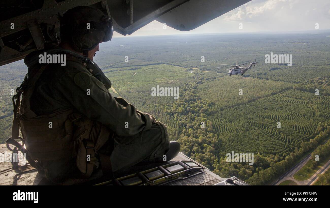 U.S. Marines with Marine Heavy Helicopter Squadron (HMH) 461 conduct a ...