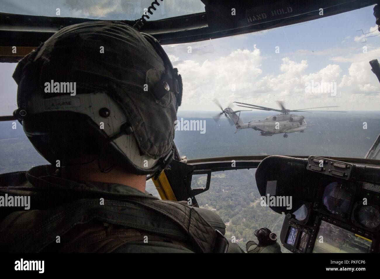 U.S. Marines with Marine Heavy Helicopter Squadron (HMH) 461 conduct a ...