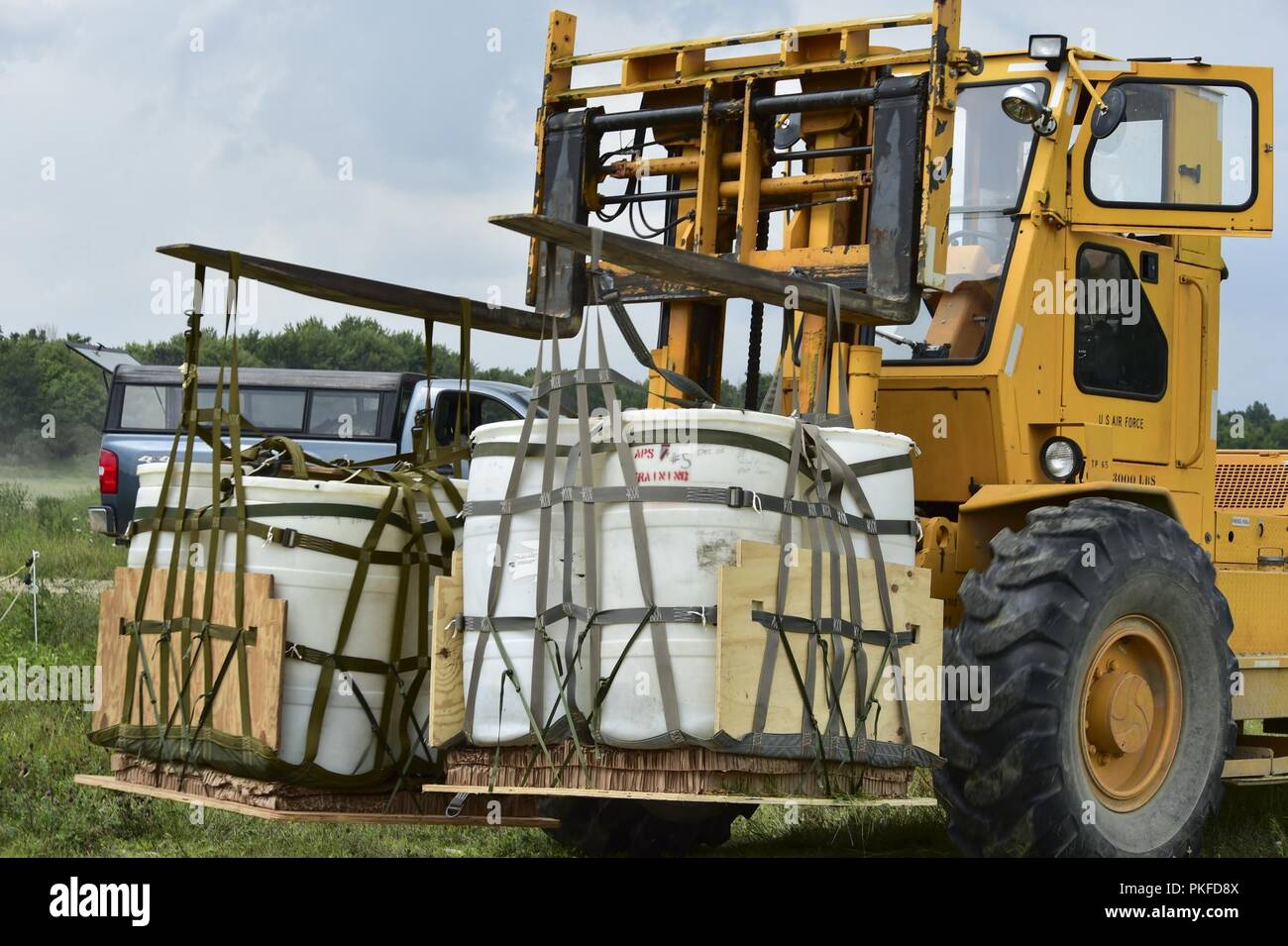 A 76th Aerial Port Squadron Reserve Citizen Airman operating a forklift ...