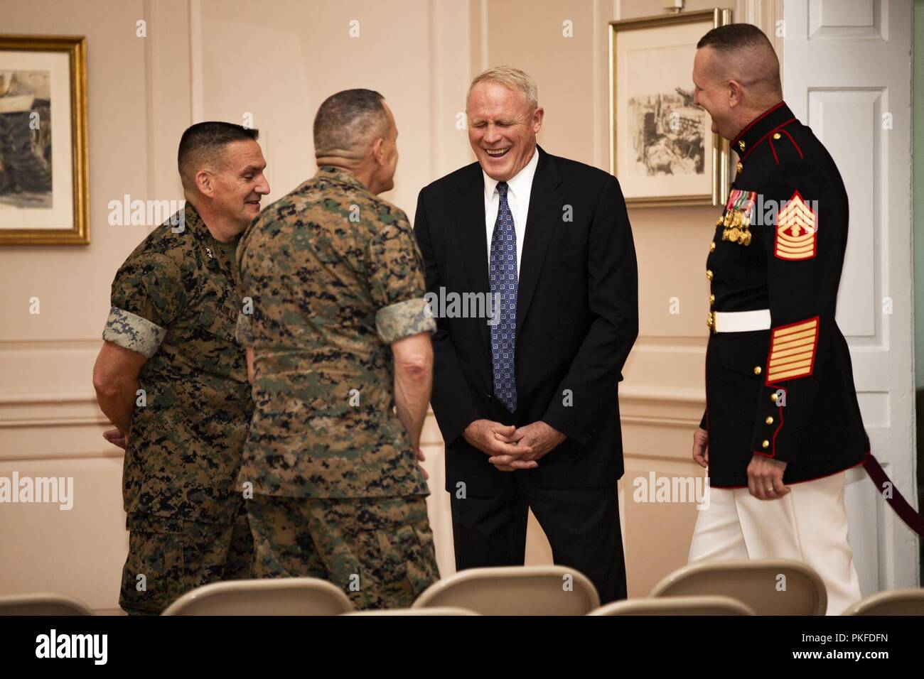 U.S. Marine Corps Master Gunnery Sgt. Bryan Boyd, right, senior ...