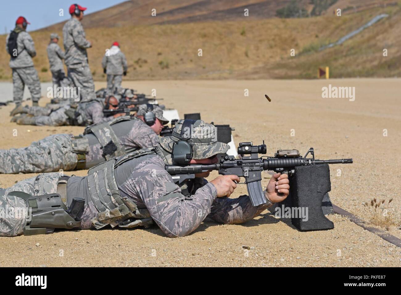 U.S. Air National Guardsmen fire M4 rifles during annual training at ...