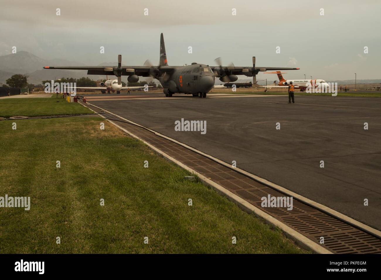 MAFFS 9, a modular airborne firefighting system-equipped C-130 from the ...