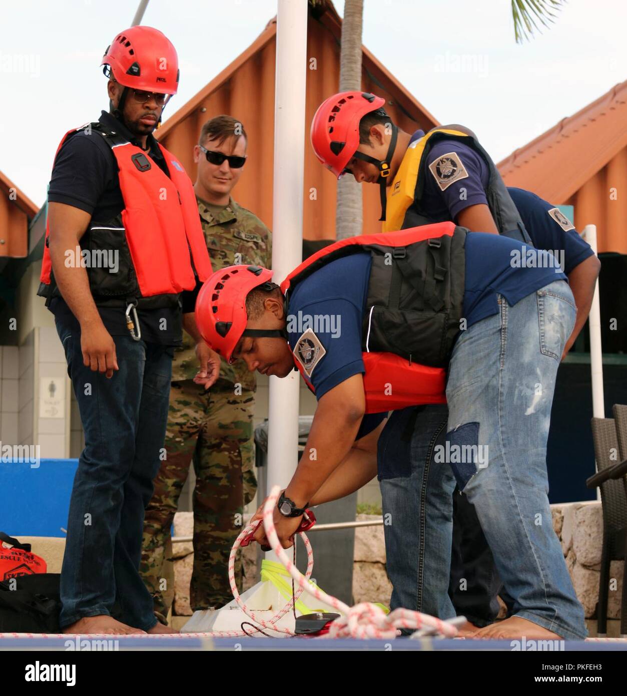 Sgt. Andrew Ware, with the Florida National Guard’s CERFP, watches ...