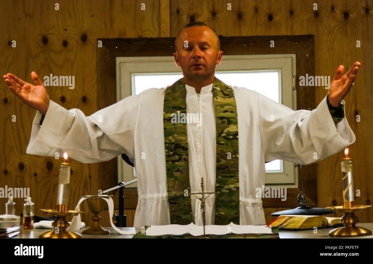 Chaplain (Cpt) Marcin Bulinski, assigned to the 101st Special Troops ...